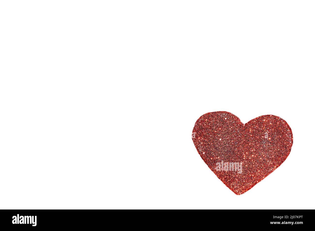 The concept of love, a declaration of love. One heart is red on a white ...