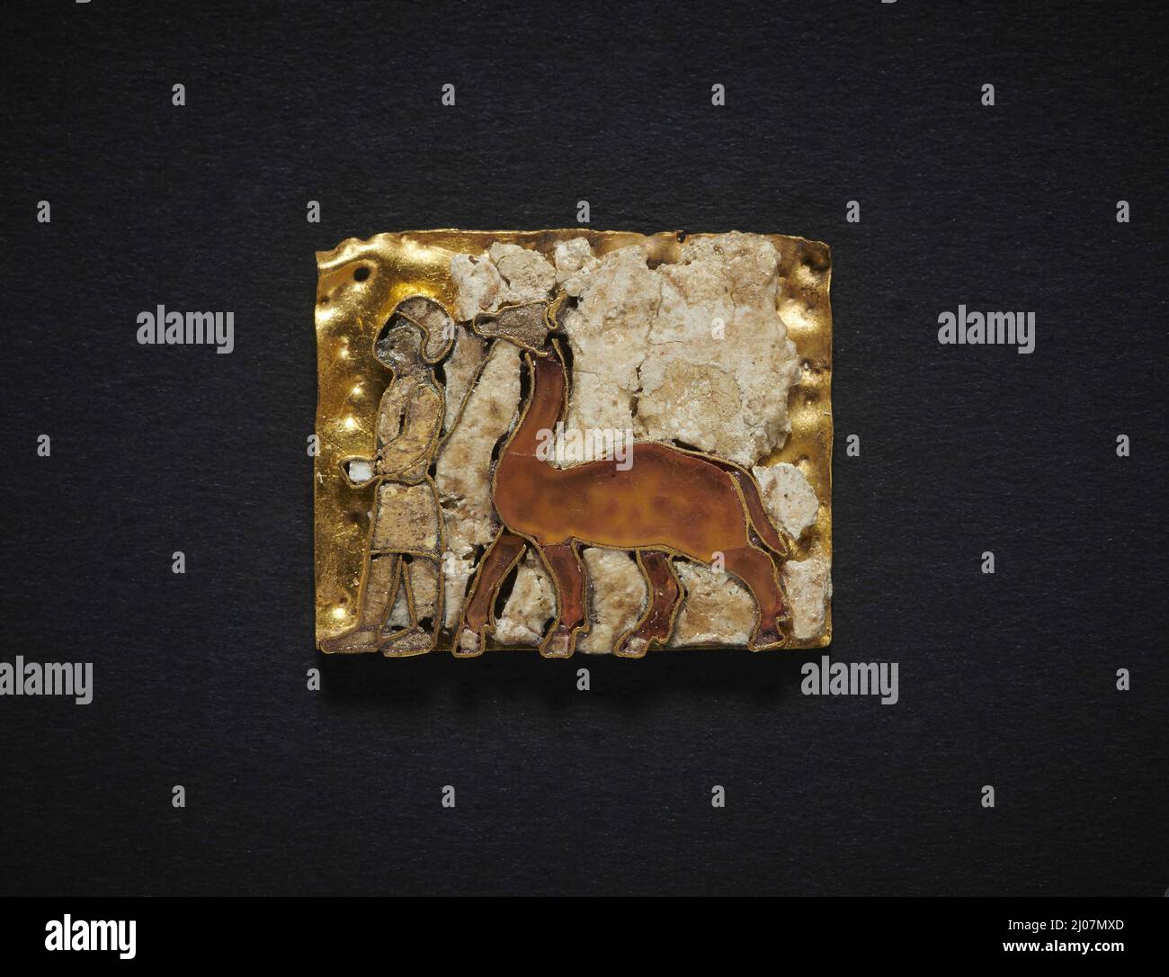 Votive plaque in cloisonné with man leading a camel. From the Oxus ...