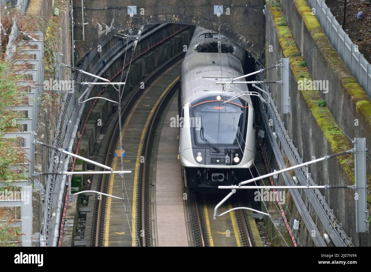 Westbound Elizabeth Line (Crossrail) Class 345 train emerging from the ...
