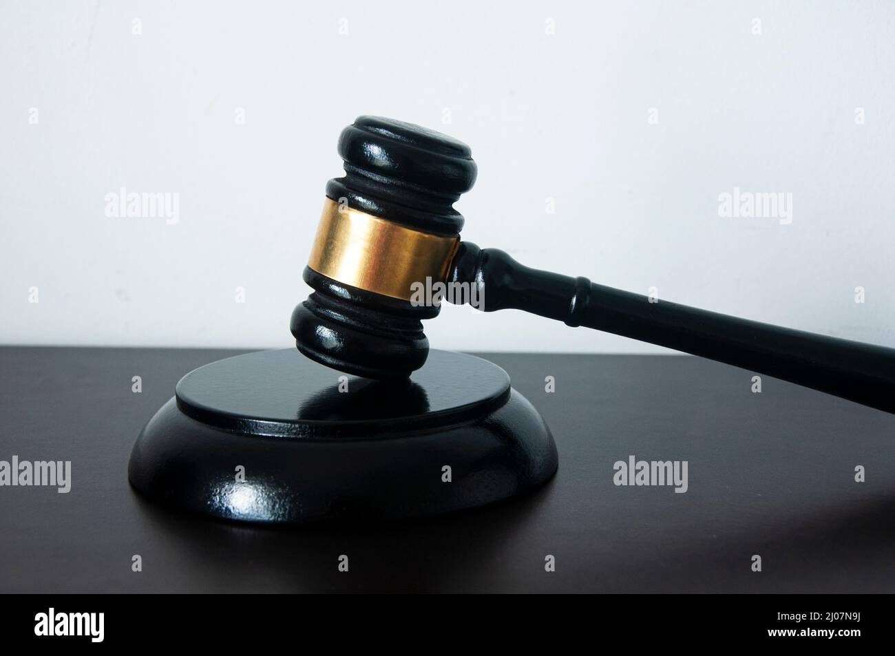 Lawyer gavel on wooden table with white background. Law concept Stock ...