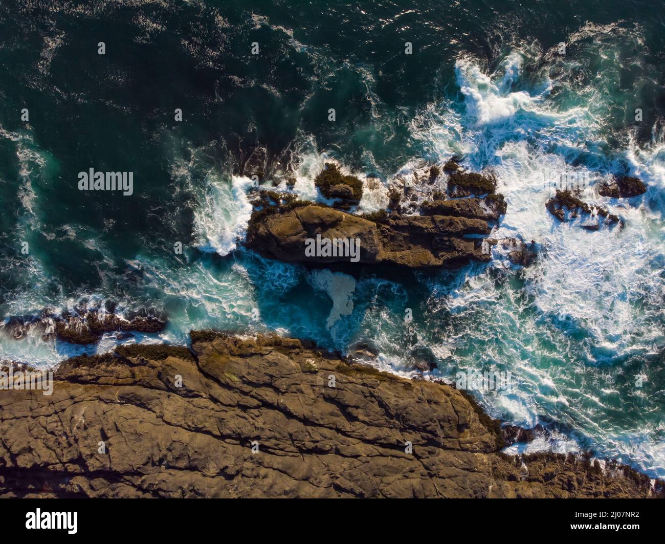 Top view of raging ocean waves and fantastic rocky coast. Wallpaper ...