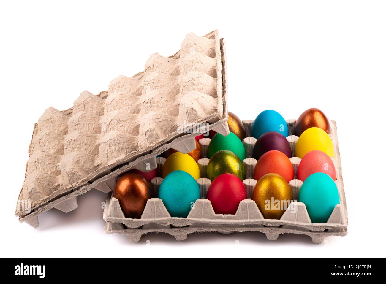 Open cardboard package with colorful Easter eggs on a white background ...