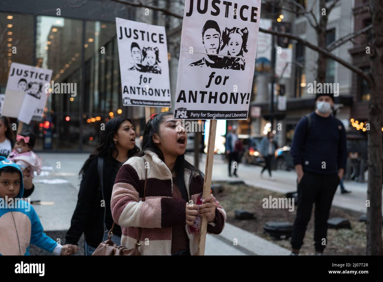 Chicago, USA. 16th Mar, 2022. Family members of Anthony Alvarez gather ...