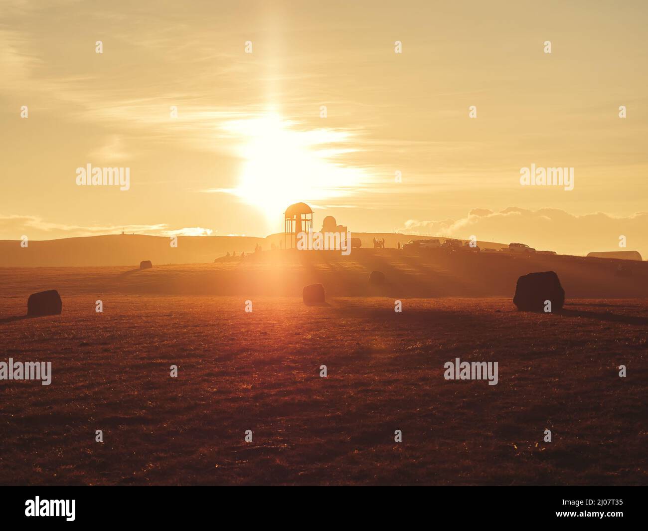 An observation platform for tourists in a golden field on top of ...