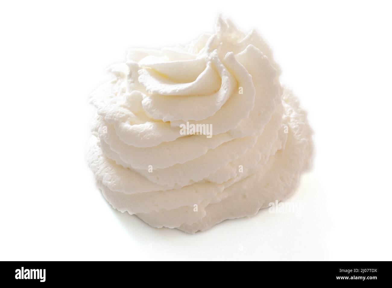 whipped cream isolated on a white background Stock Photo - Alamy