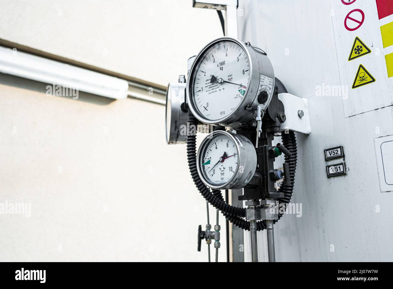 Liquid nitrogen refilling process, closeup view at barometers ...