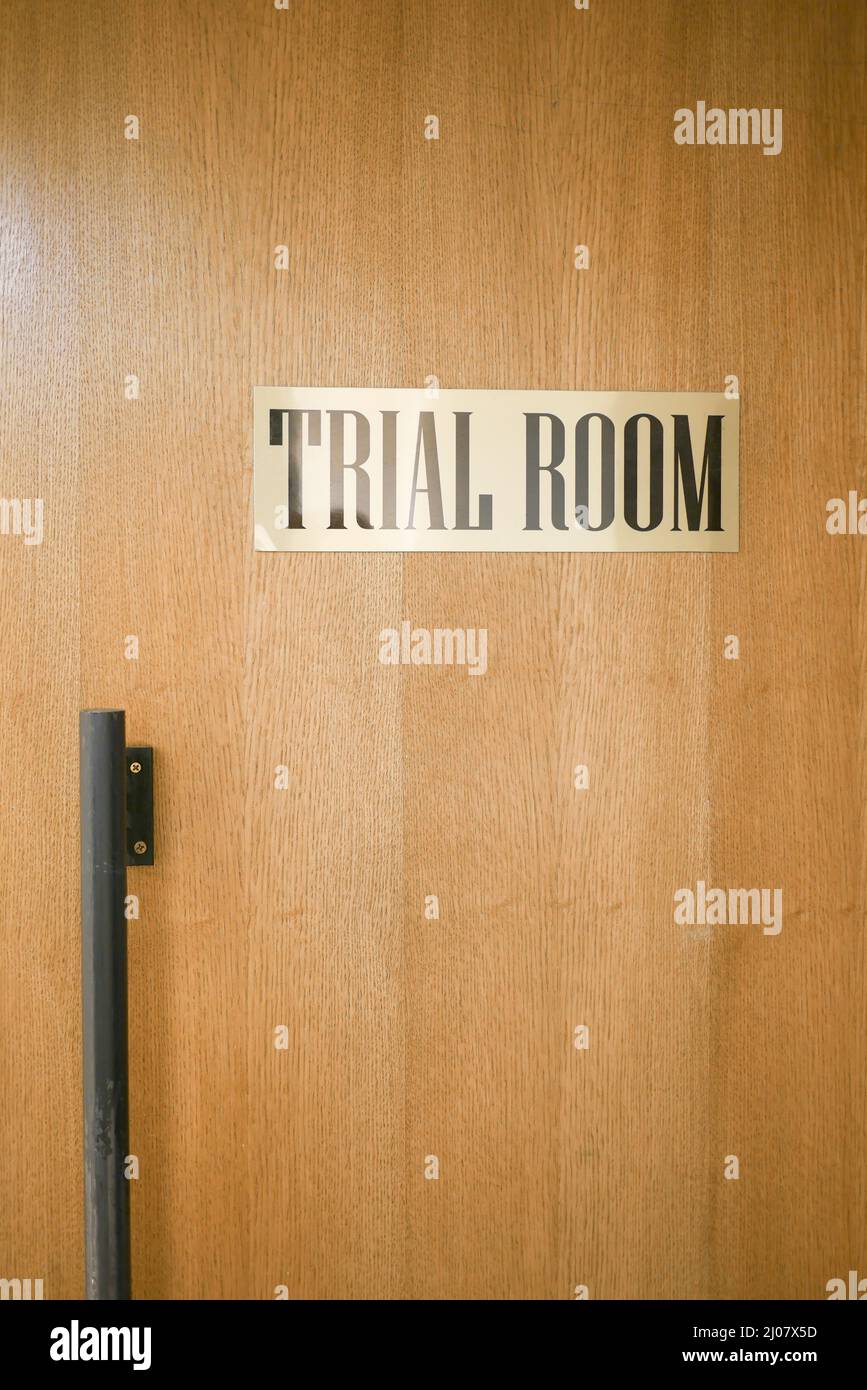 Sign of a trial room on a door Stock Photo - Alamy