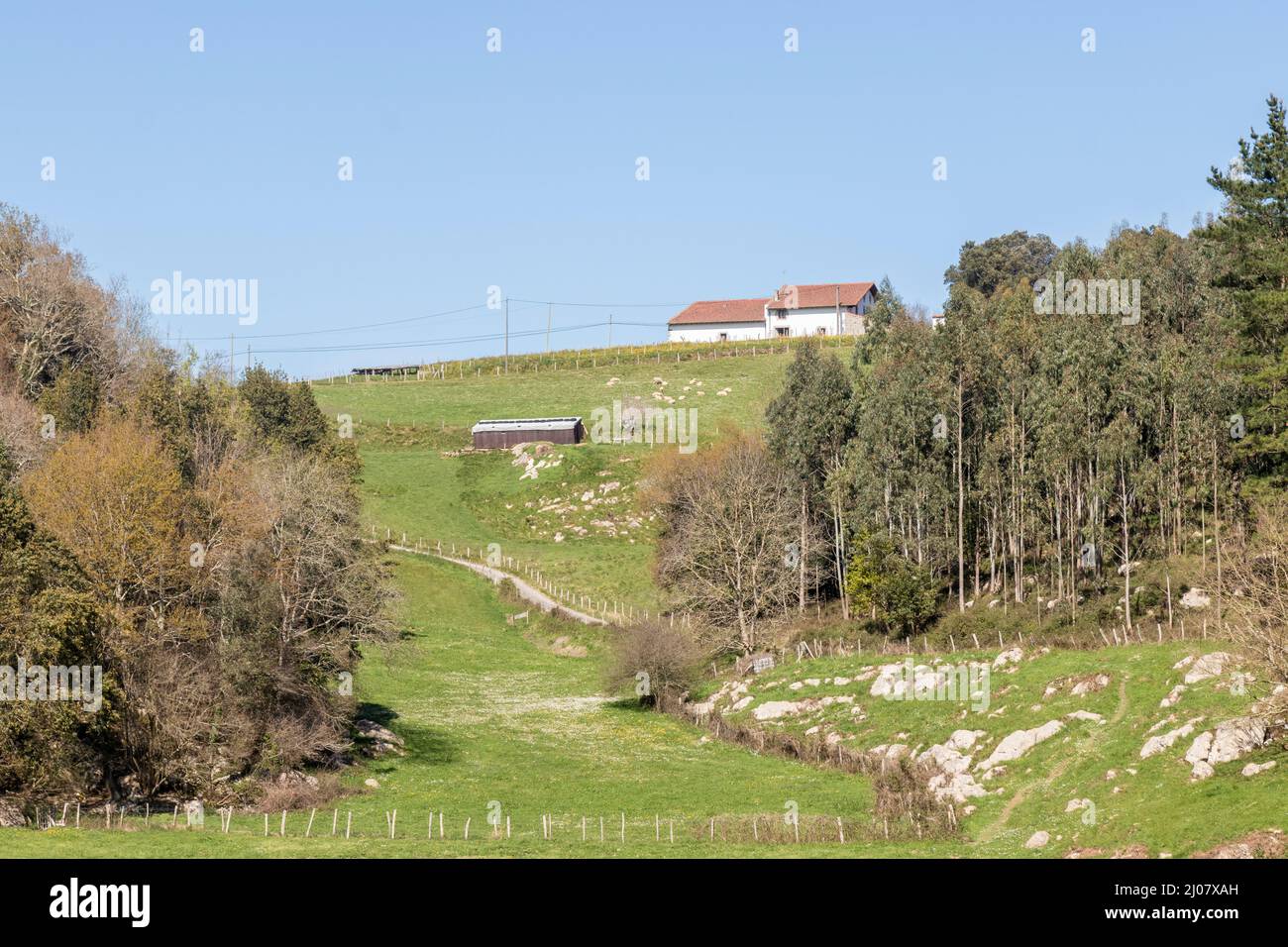 typical farmhouse of the basque country on a hill Stock Photo - Alamy