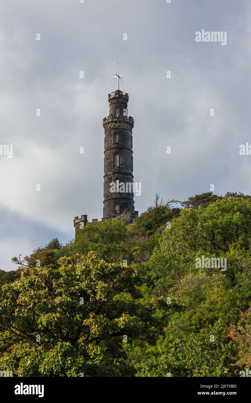 A vertical low angle shot of the Nelson Monument tower in Edinburgh ...