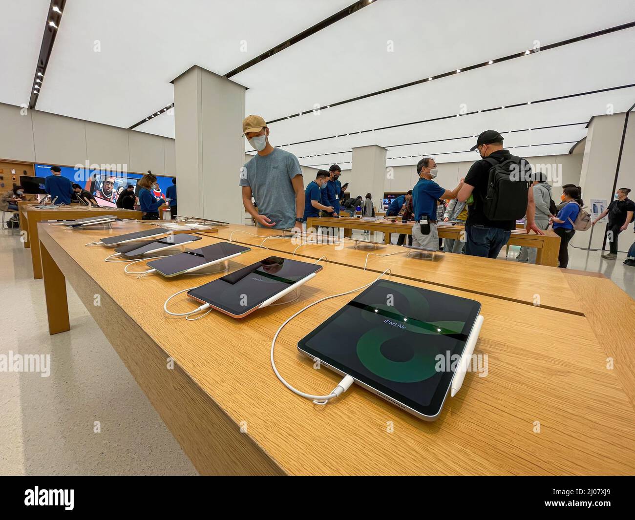 The new iPad Air 5 exposed at an Apple retail store in Taipei. Apple launches sales of its ...