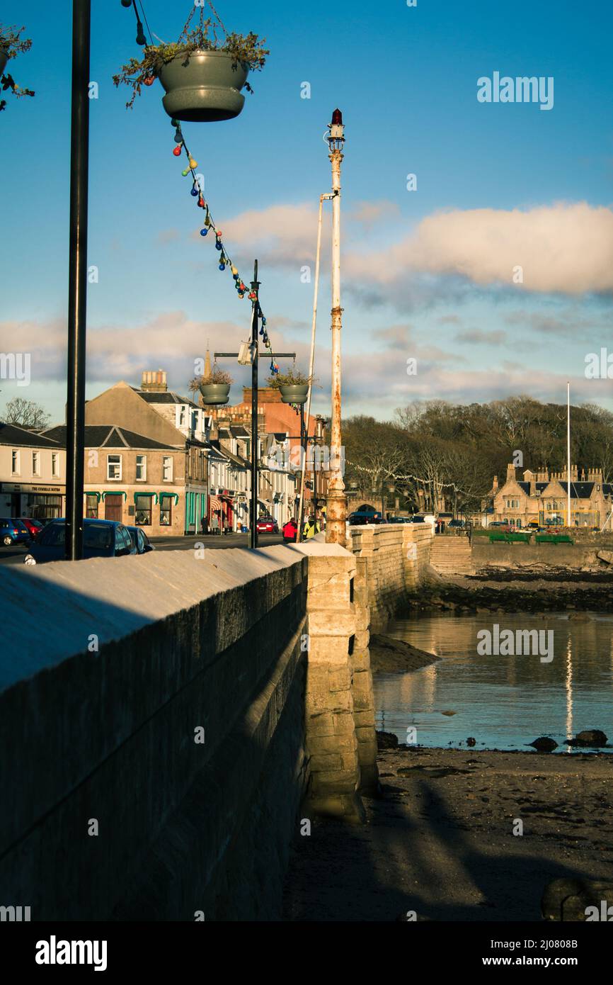 Vertical shot of a body of water and a bridge in the city of Largs ...