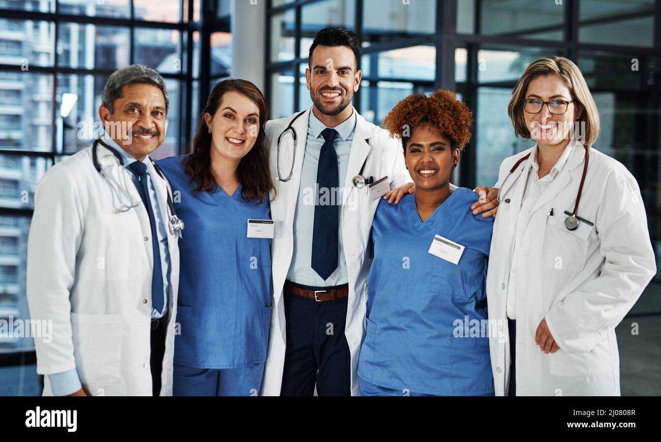 Working together with your wellness in mind. Portrait of a team of ...