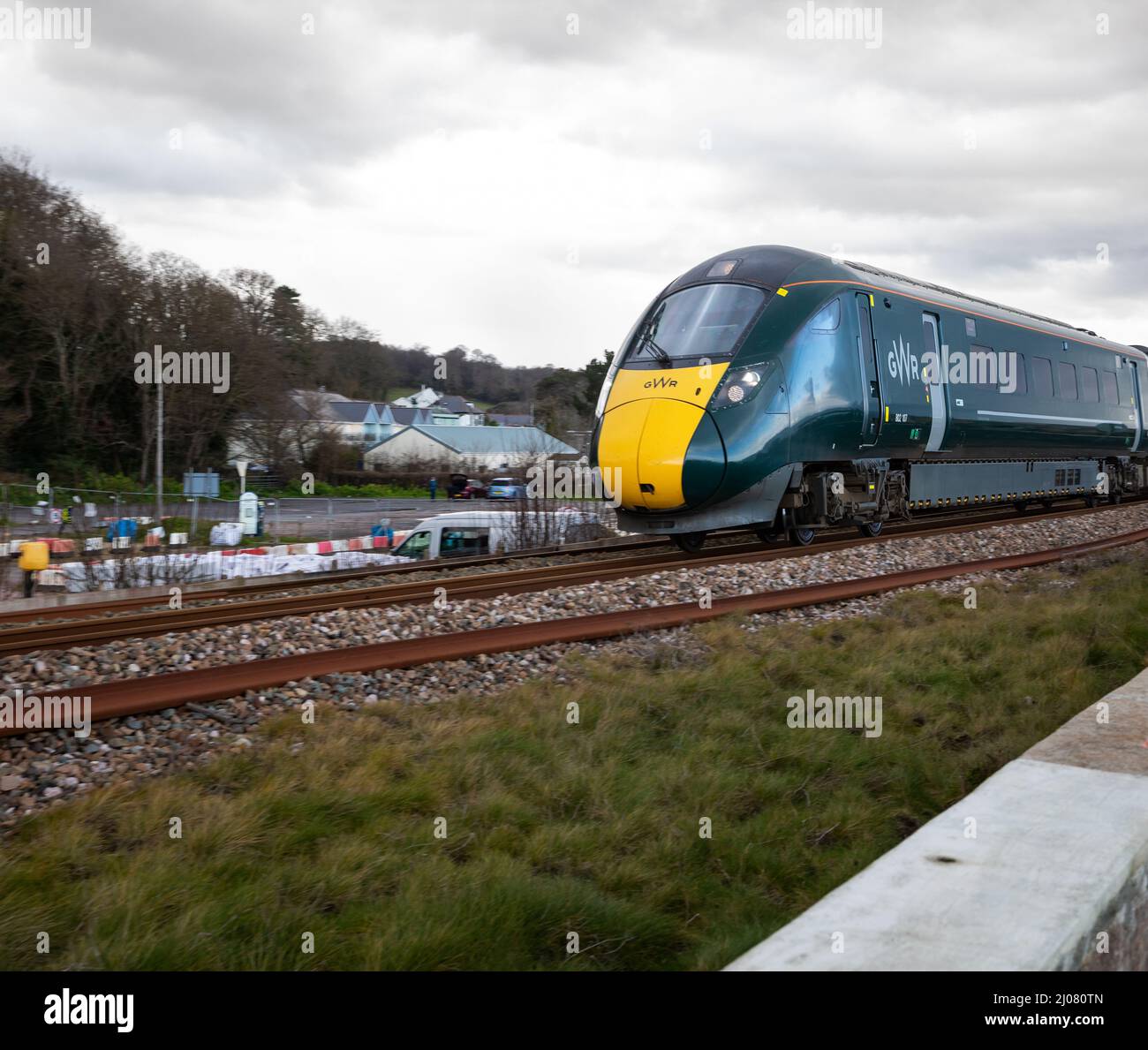 GWR train passes through Dawlish Warren in Devon, Uk Stock Photo - Alamy