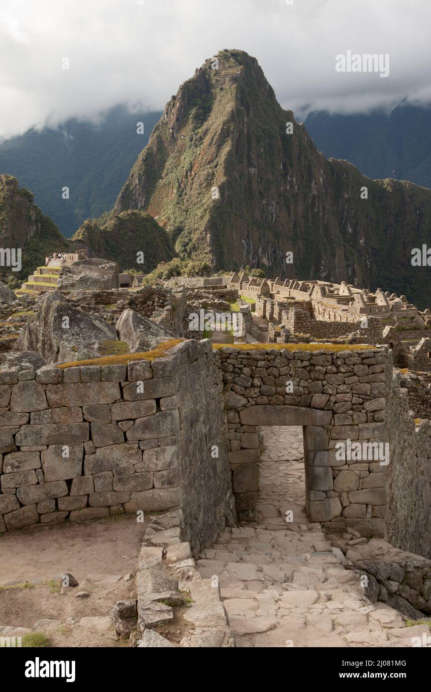 Machu Picchu Inca archaeological site on the Andes Mountains, Peru ...