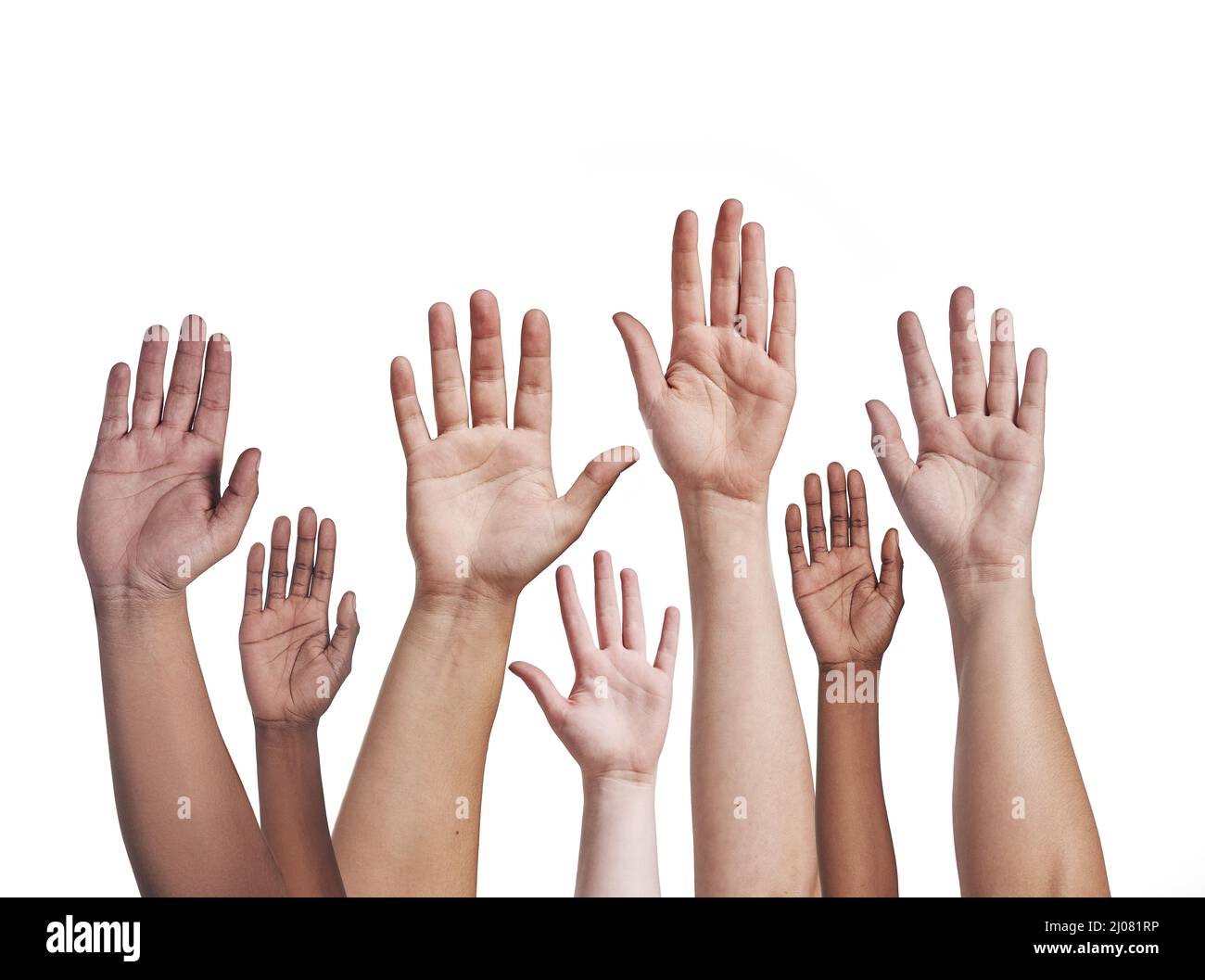 Lift your hands as one. Shot of a group of hands reaching up against a ...