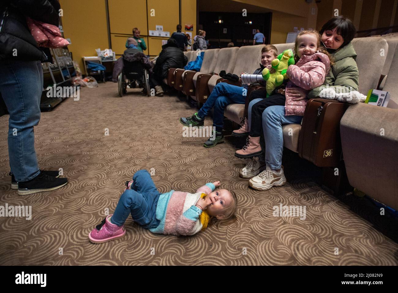 Prague, Czech Republic. 17th Mar, 2022. War refugees are waiting for a ...