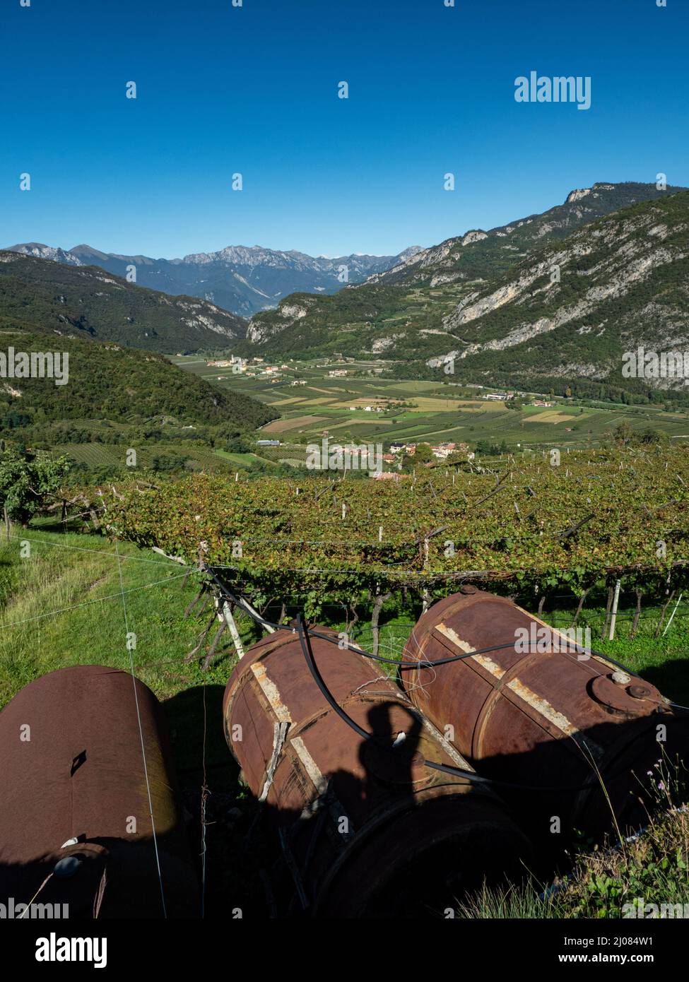 Irrigation tanks on the hill of Mori overlooking Loppio, Trentino ...