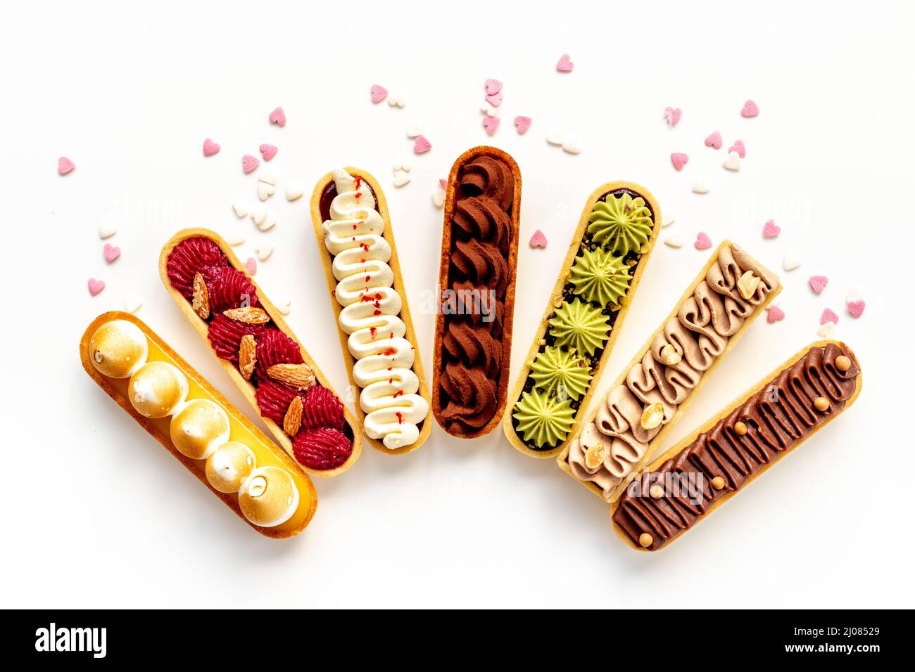 Top view of sweet bakery eclairs with color topping Stock Photo - Alamy