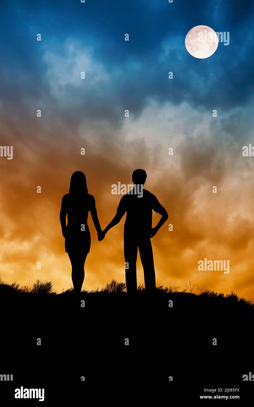 Couple Looking At The Moon