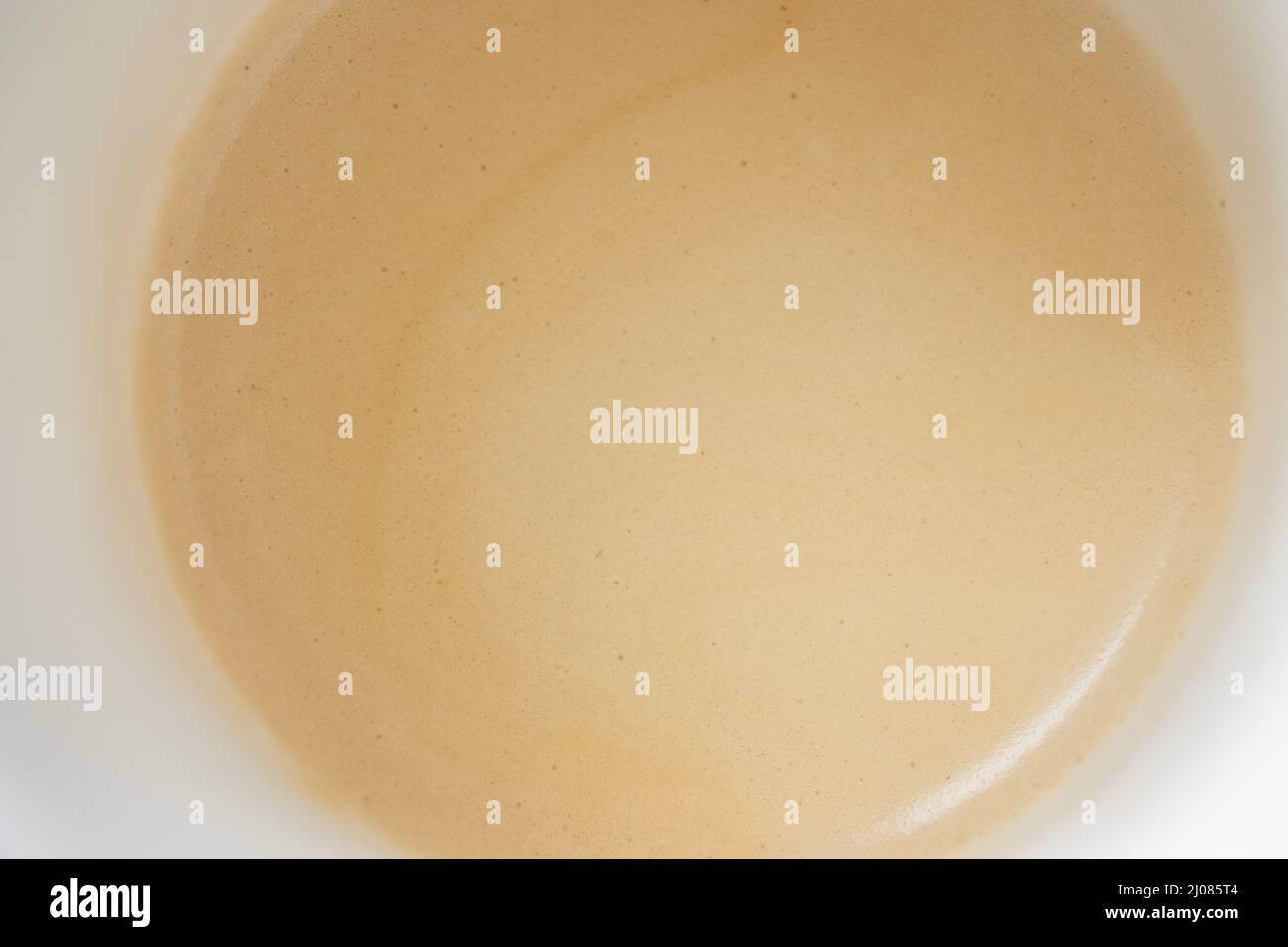 Cream of freshly brewed coffee background or texture Stock Photo - Alamy