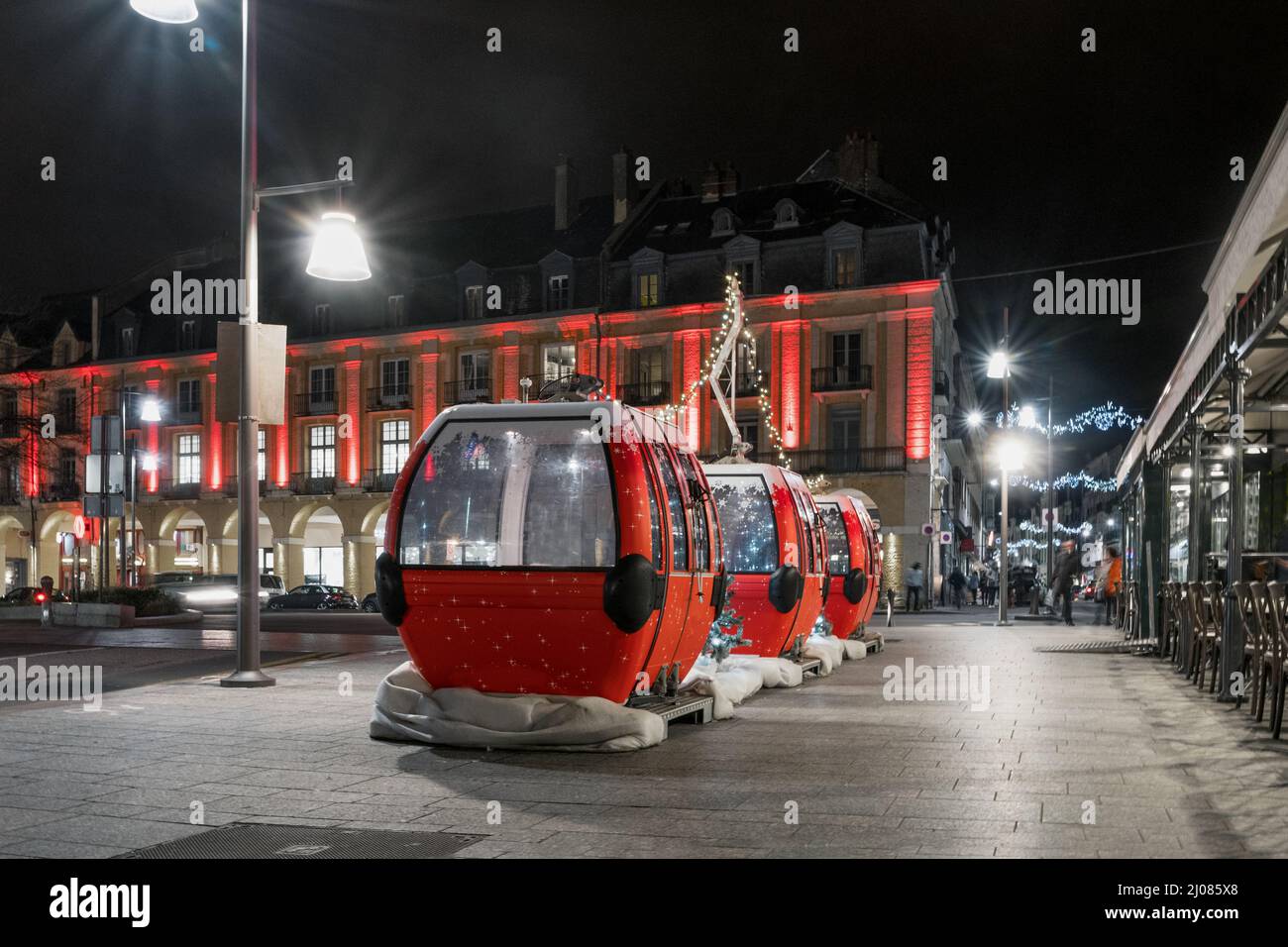Urban night landscape with cable cars as scenery and illuminated lamps ...