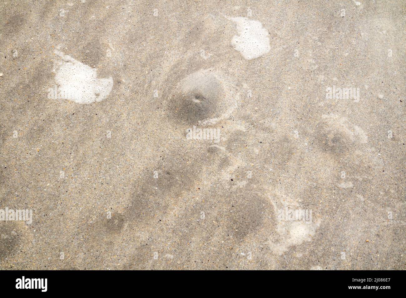 Bubbles in the sand hi-res stock photography and images - Alamy