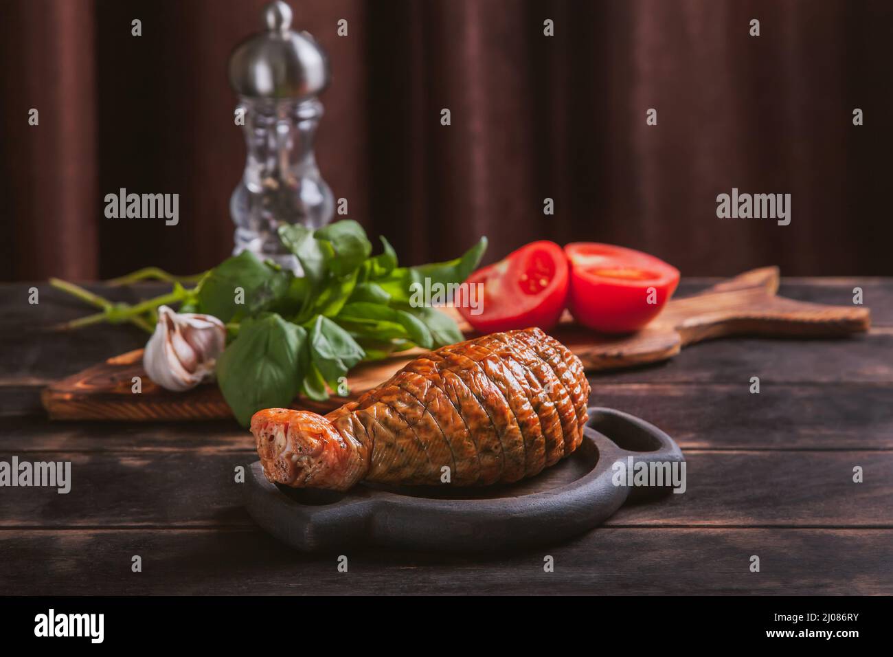 Artisan ham made from turkey meat, boiled and smoked with the addition ...
