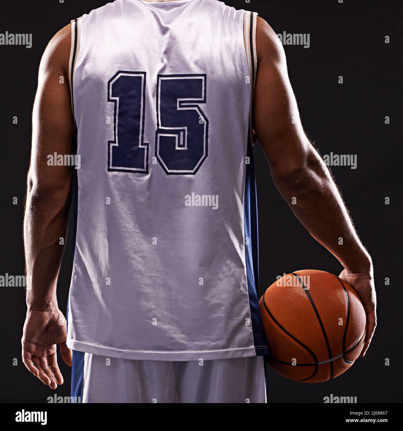 Never back down from a challenge. Cropped shot of a basketball player ...