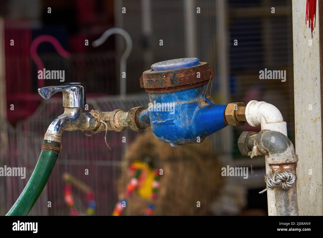Vintage water meter and faucet closeup Stock Photo - Alamy