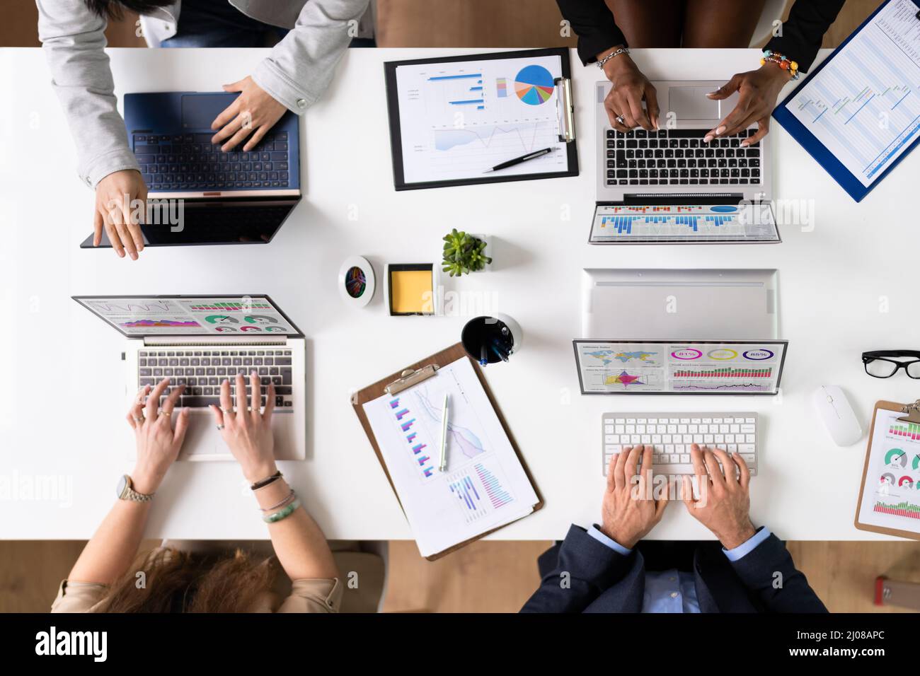 Business People Boardroom Meeting In Office. Above View Stock Photo - Alamy