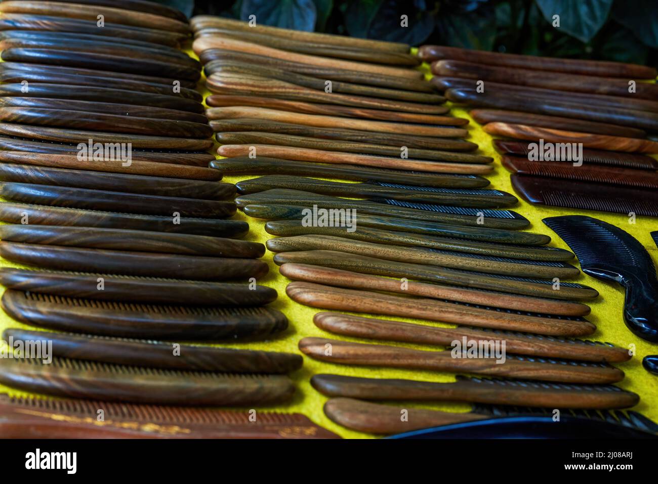 Rows of Chinese wooden combs in a store Stock Photo - Alamy