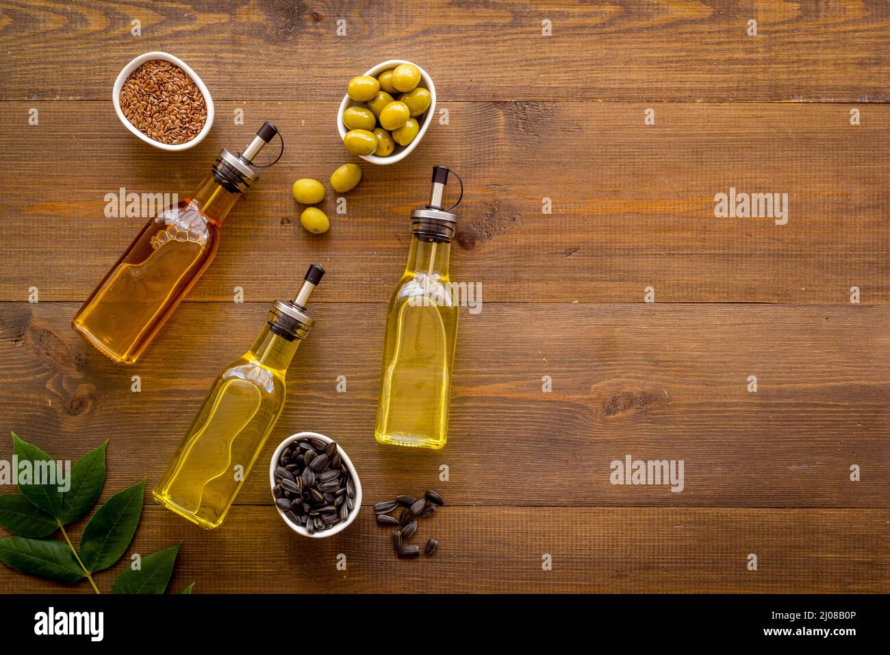 Three types of cooking oil - sunflower olive and sesame oil Stock Photo ...