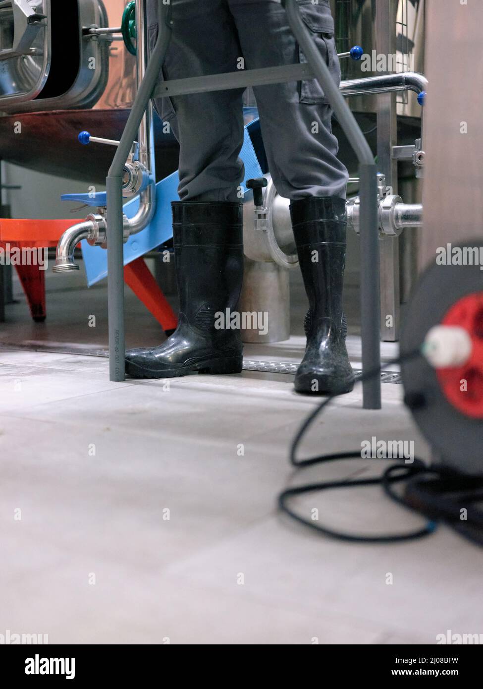 Rubber factory worker hi-res stock photography and images - Alamy