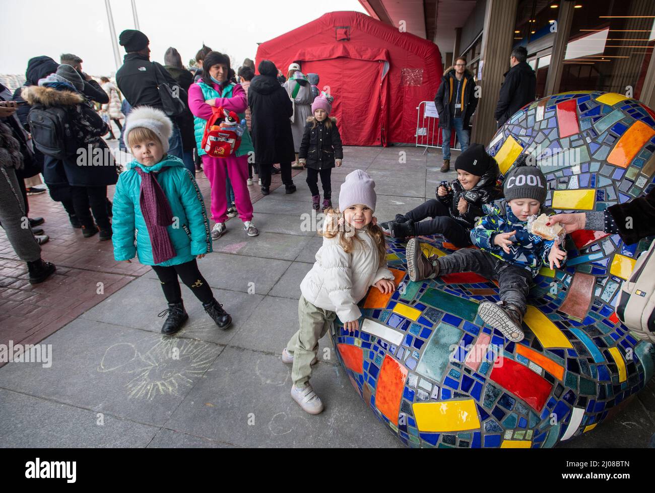Prague, Czech Republic. 17th Mar, 2022. War refugees are waiting for a ...
