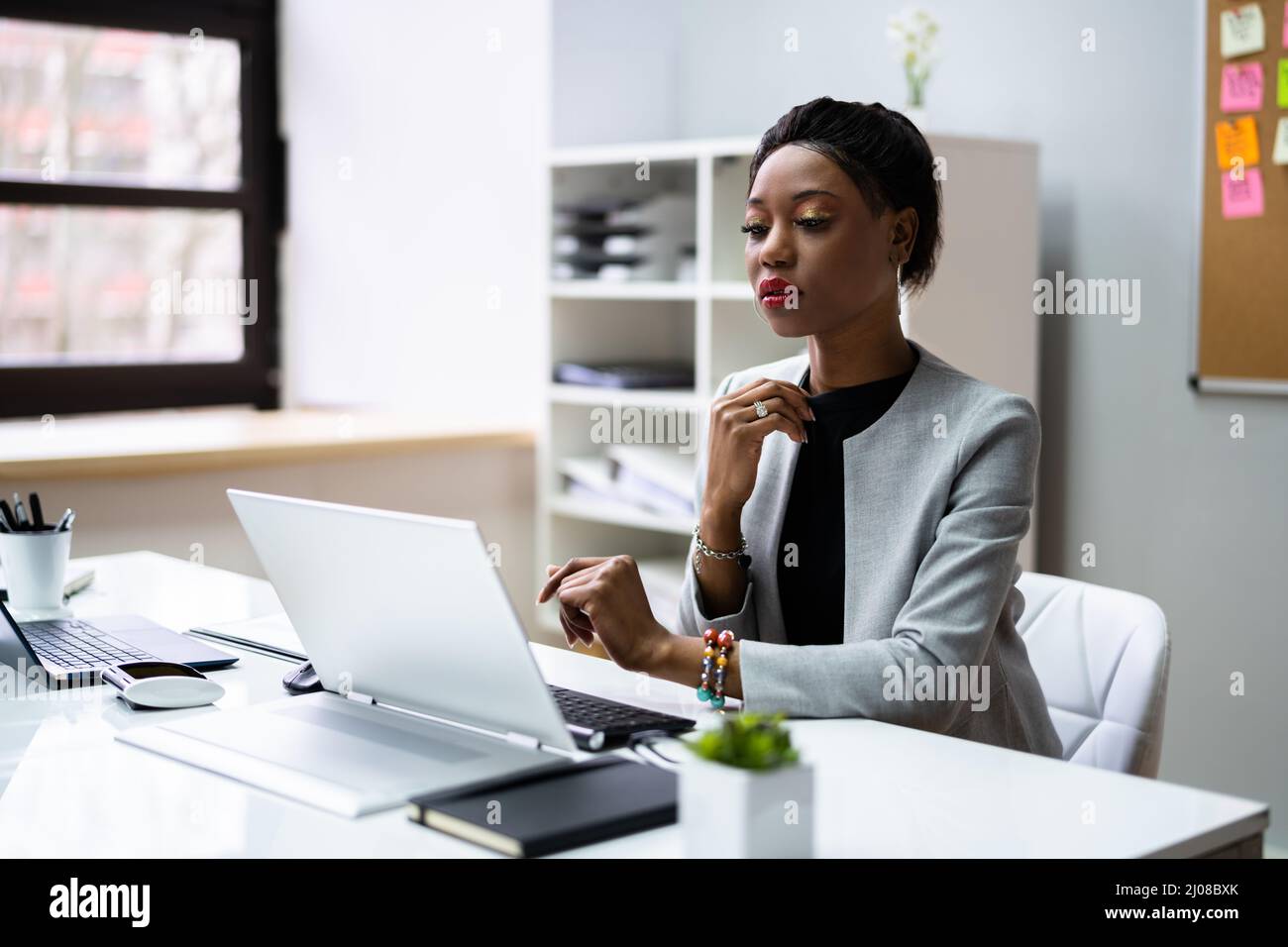 Hot Office Weather. Woman Sweating At Work Stock Photo - Alamy