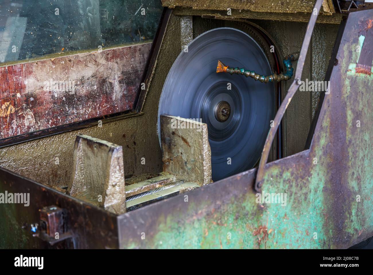 Close-up of a machine for cutting jade with a grinding wheel Stock ...