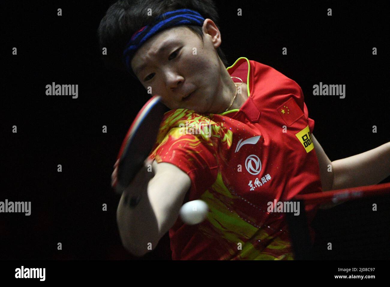 Singapore. 17th Mar, 2022. Wang Manyu of China hits a return during the ...