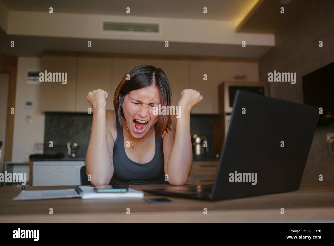 remote job, failure and stress concept - angry young woman with laptop ...