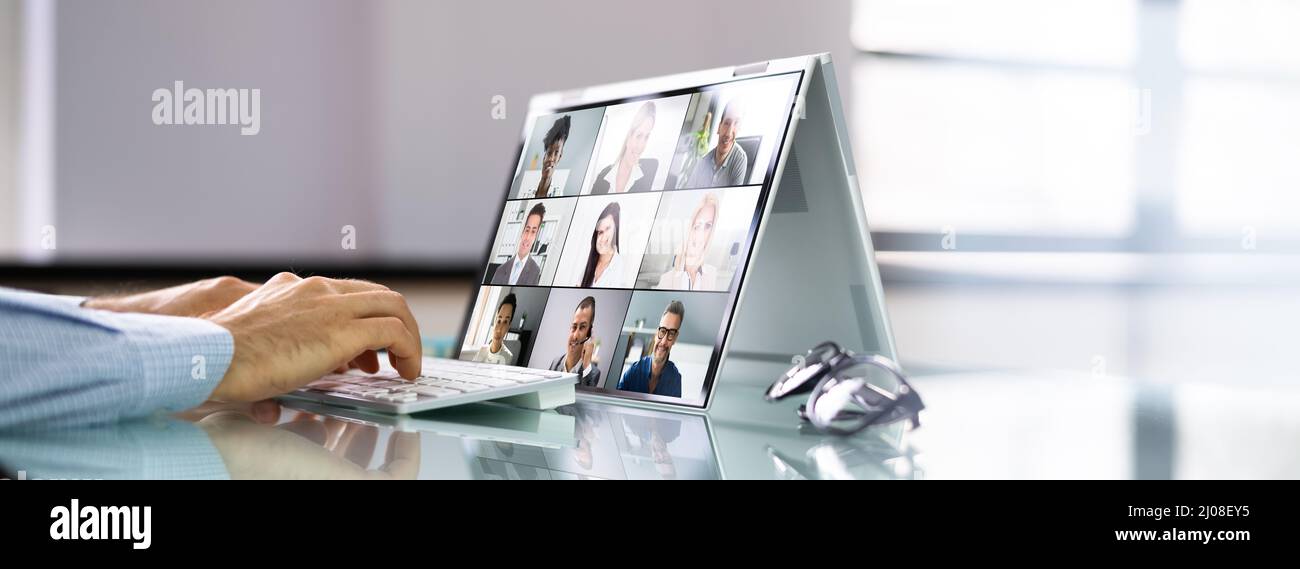 Virtual Conference Meeting In Office Room On Hybrid Convertible Laptop ...
