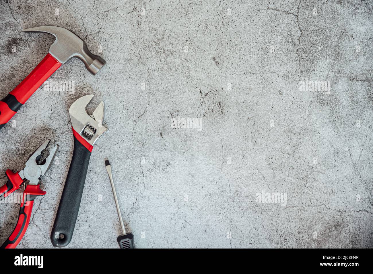 Top view of construction instruments and tools on the stone background ...