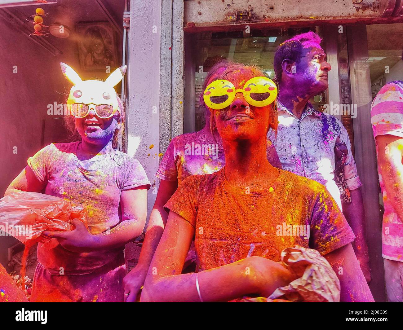 Devotees celebrate the festival of colors. Holi is a popular ancient ...