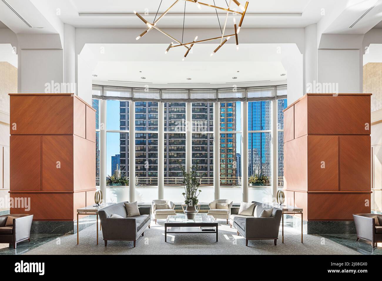 A high rise condominium lobby in downtown Chicago with cozy furniture ...