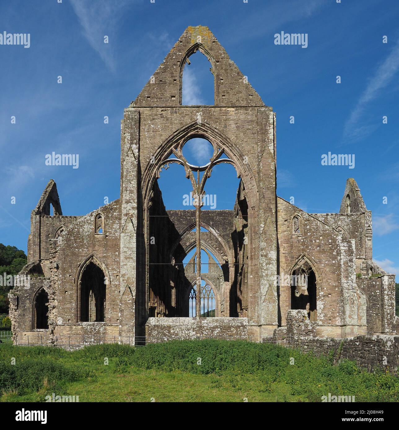 Window at Tintern Abbey (Abaty Tyndyrn in Welsh) ruins in Tintern, UK ...