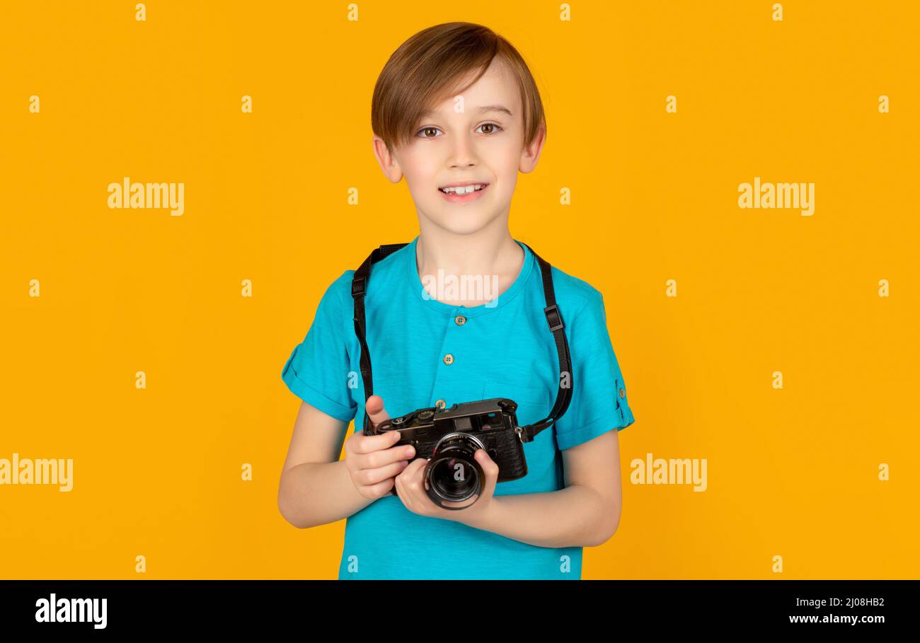 Boy using a cameras. Baby boy with camera. Cheerful smiling child ...