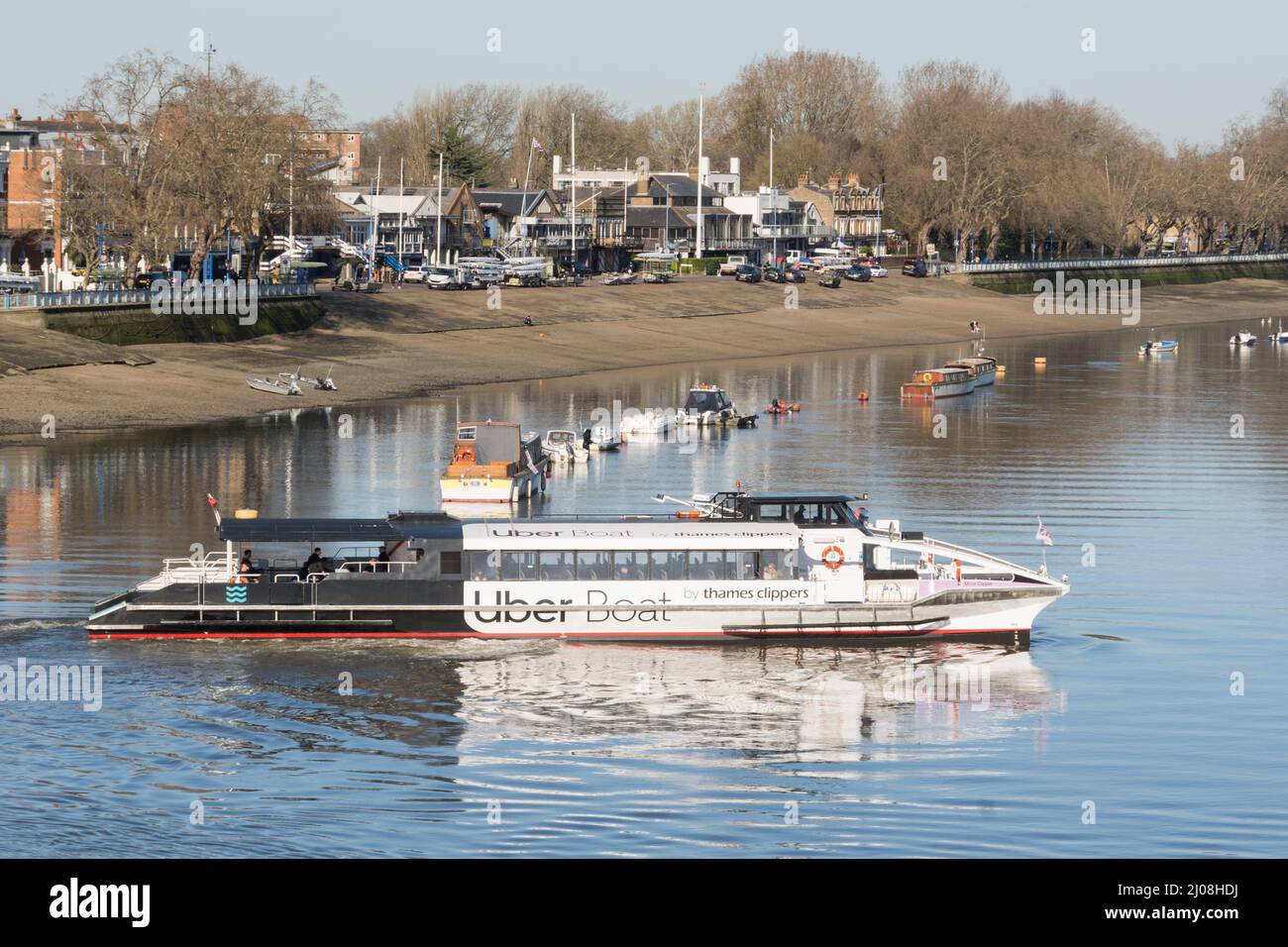 A Uber Boat Thames clipper departing Putney Pier, Putney, southwest ...