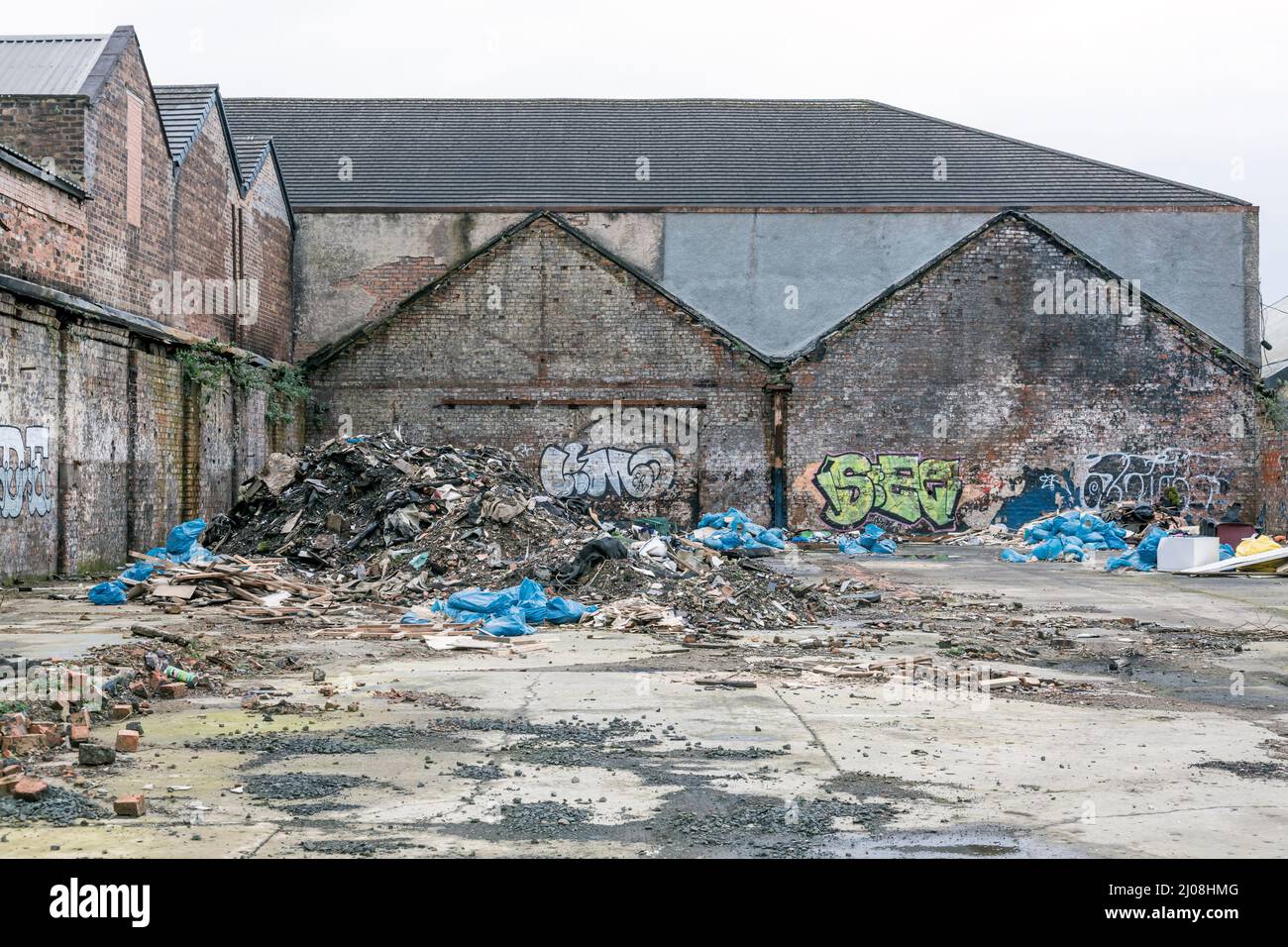 Rubbish dumped on waste ground, Glasgow, Scotland, UK Stock Photo - Alamy
