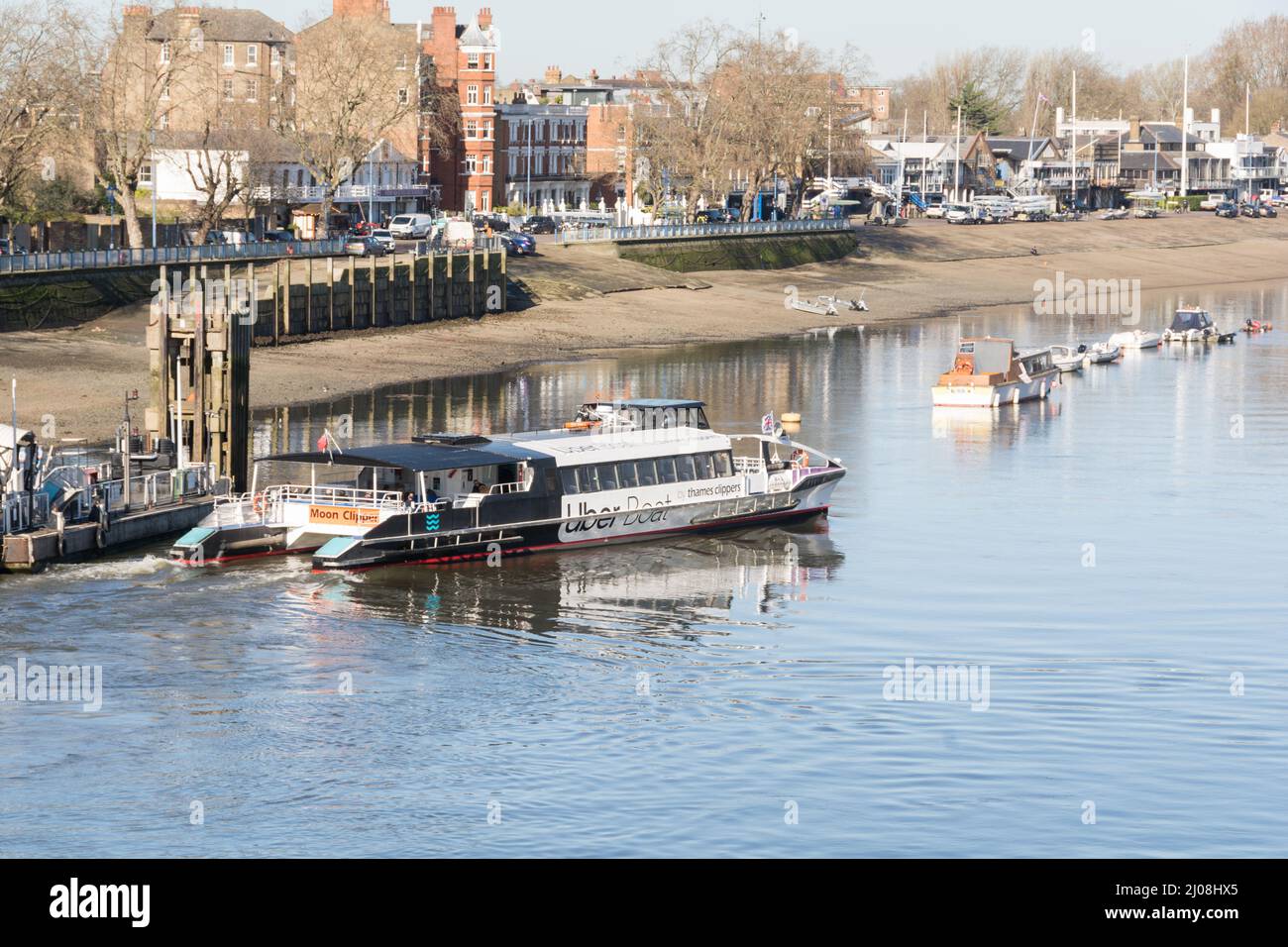 A Uber Boat Thames clipper departing Putney Pier, Putney, southwest ...