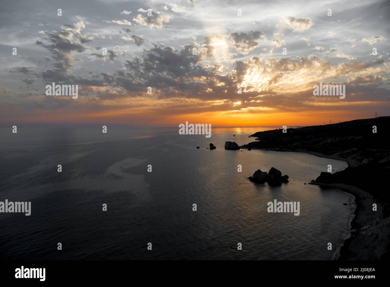 Sunset seascape near Aphrodite's Rock. Paphos District, Cyprus Stock ...