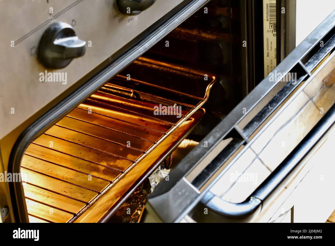 open oven in the kitchen Stock Photo - Alamy
