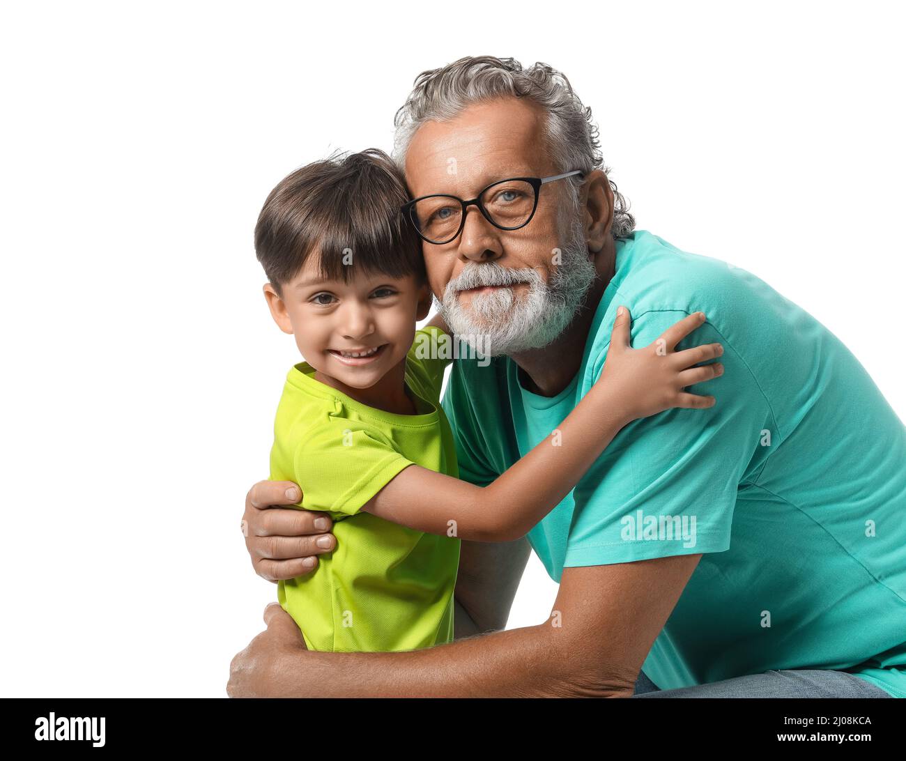 Little boy with his grandfather hugging on white background Stock Photo ...